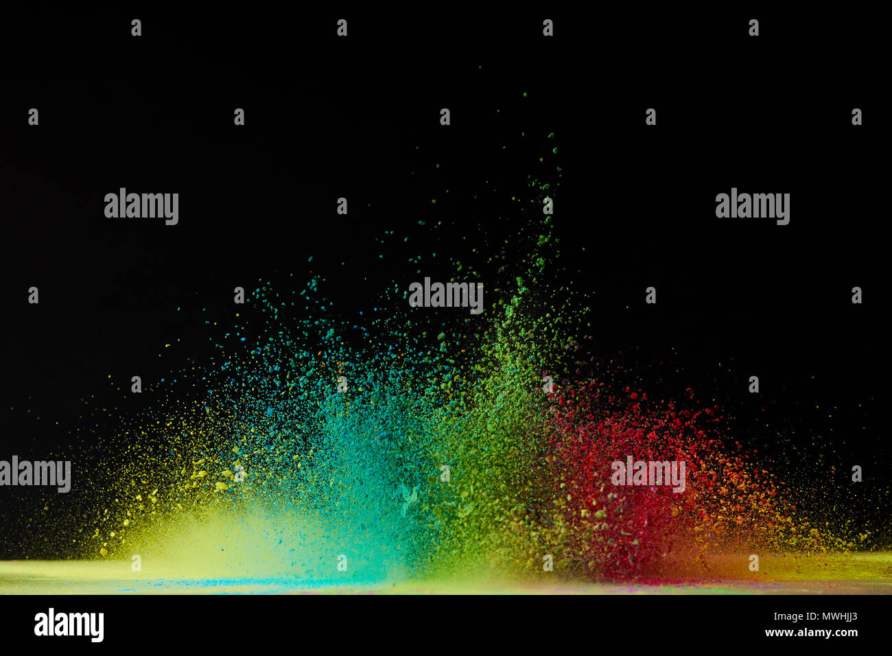 colorful holi powder explosion on black, festival of colours Stock ...