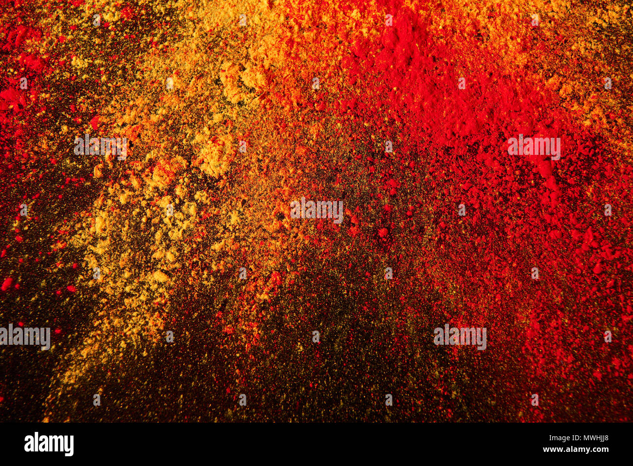 colorful holi powder explosion on black Stock Photo - Alamy