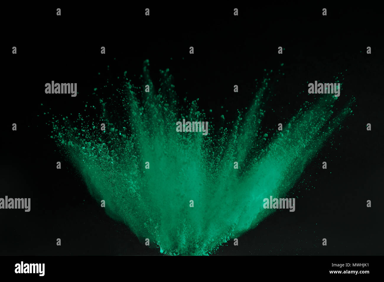 green holi powder explosion isolated on black, Hindu spring festival ...