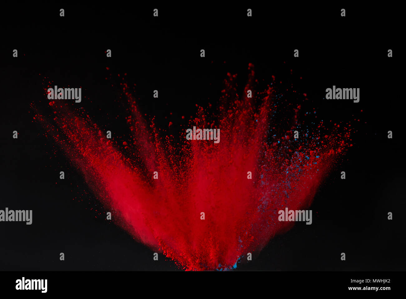 red holi powder explosion isolated on black, festival of colours Stock ...