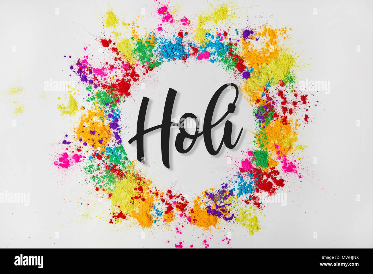 circle frame of colorful traditional paint with Holi sign, isolated on ...