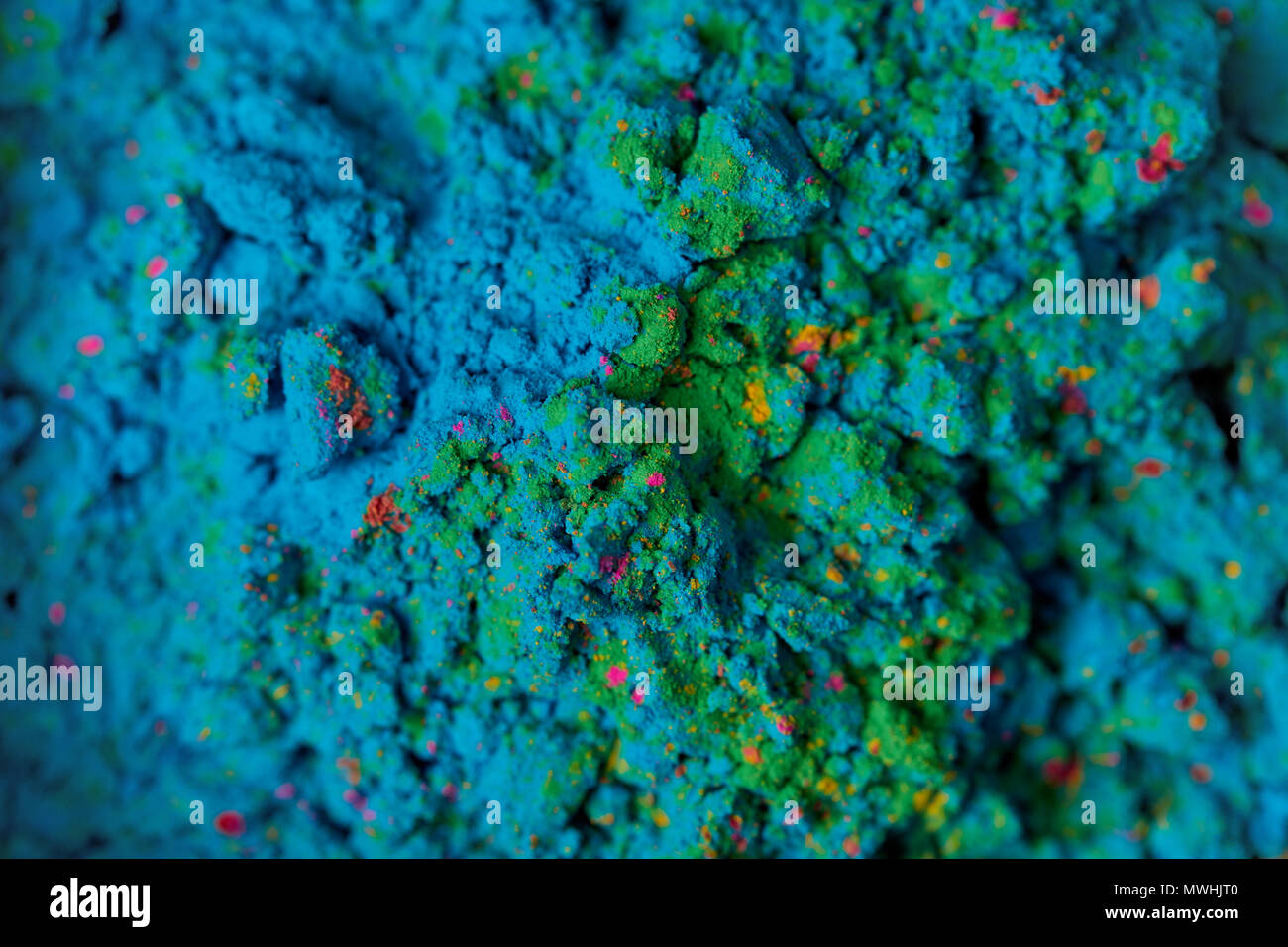 top view of green and blue holi powder, traditional Indian festival of ...