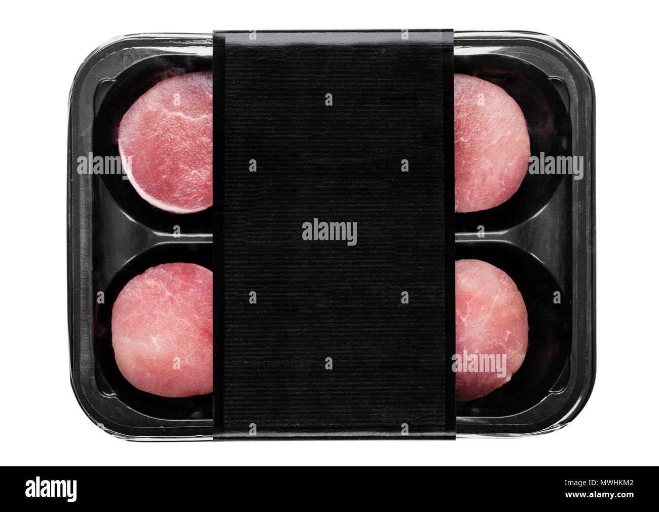 Raw round pork steak slices in plastic tray container with black label ...
