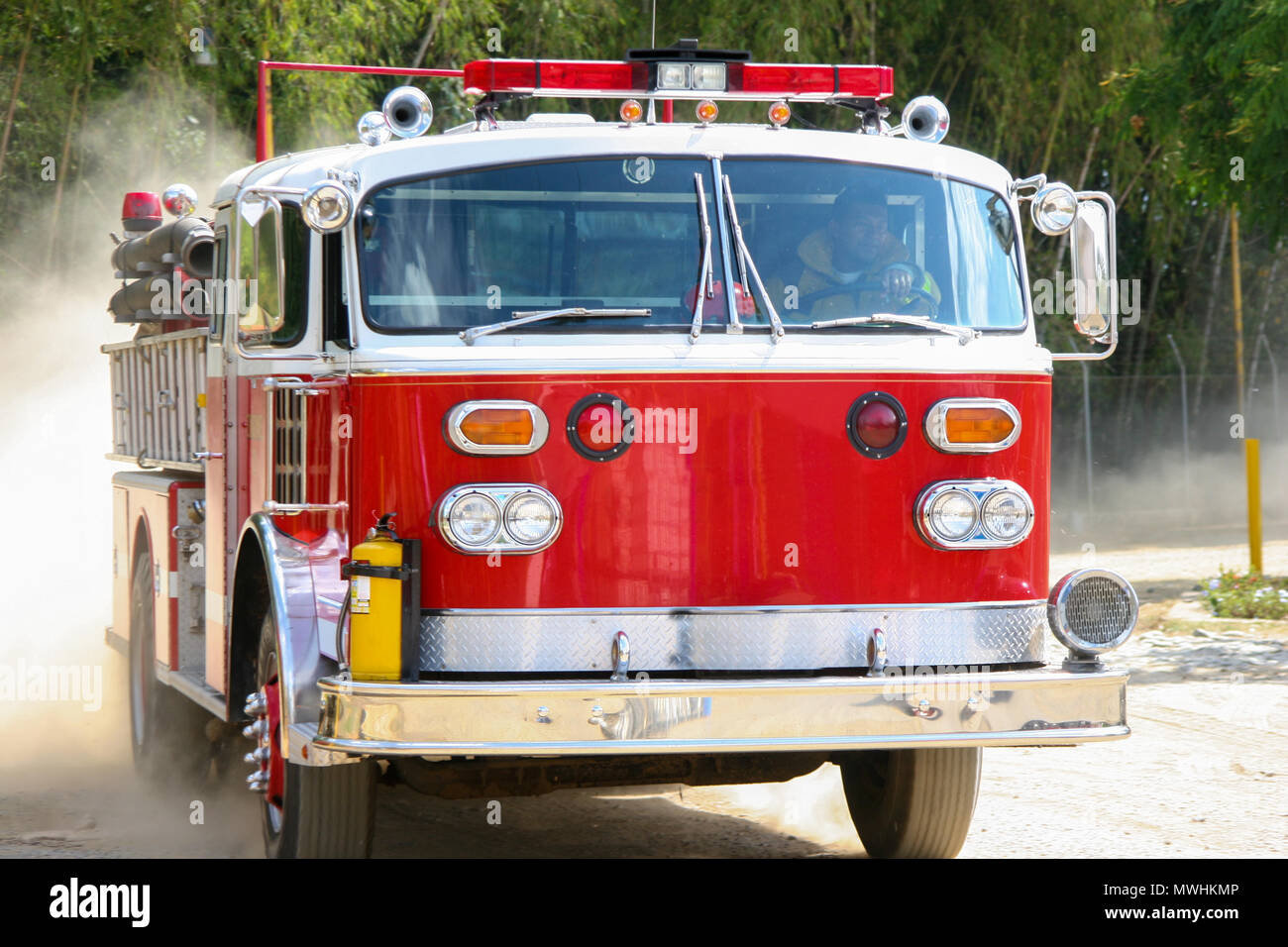 A Shiny Red Fire Truck In Action, In Motion Stock Photo - Alamy