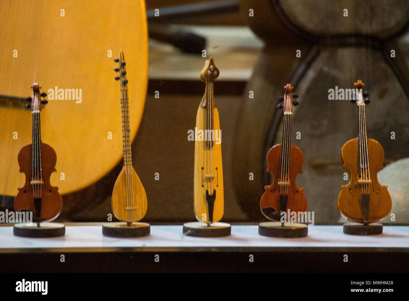 Set of models of musical instruments made of wood Stock Photo - Alamy