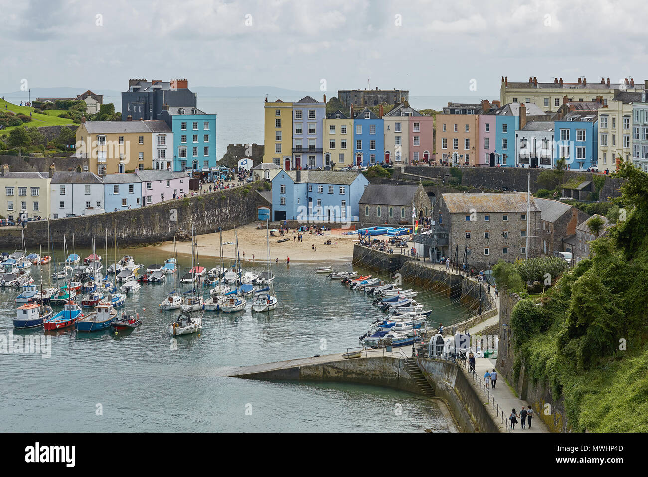 TENBY, WALES, UK - AUGUST 13, 2017: The harbour and Castle at Tenby, an ...