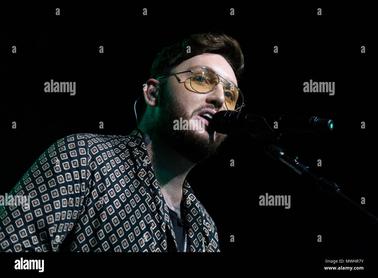 Pop singer and former X Factor winner James Arthur performing live ...