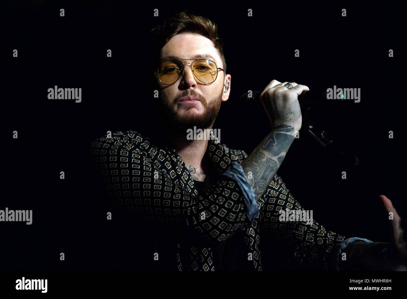 Pop singer and former X Factor winner James Arthur performing live ...