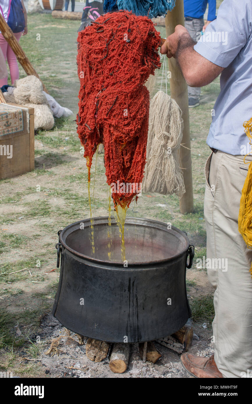 Natural wool dyeing in pots for carpet making Stock Photo - Alamy