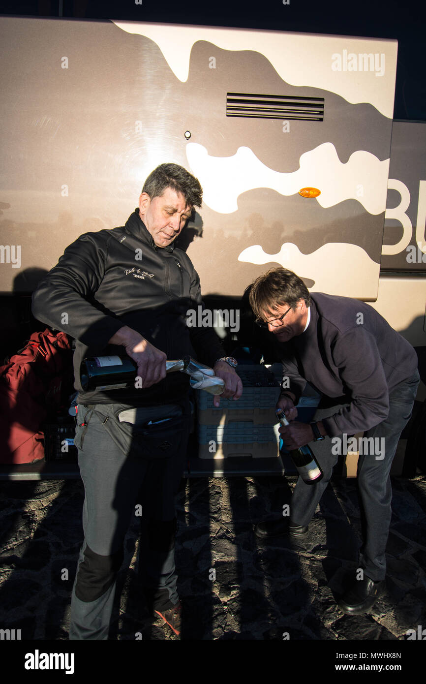 Tenerife pouring Champagne on mountain to watch the sunset man with ...