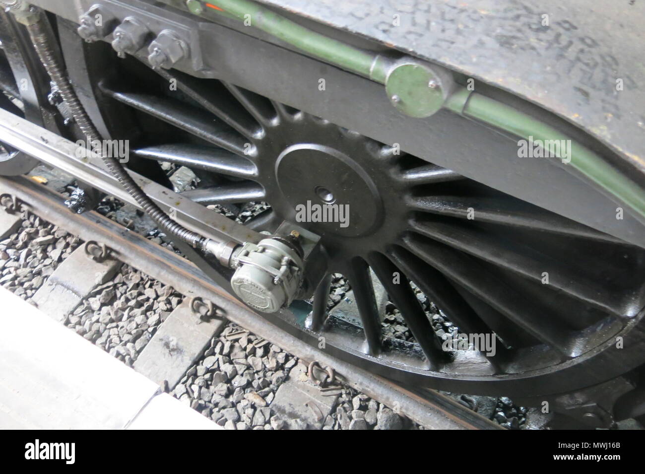 Close up of the wheel of the Flying Scotsman on the tracks at London ...