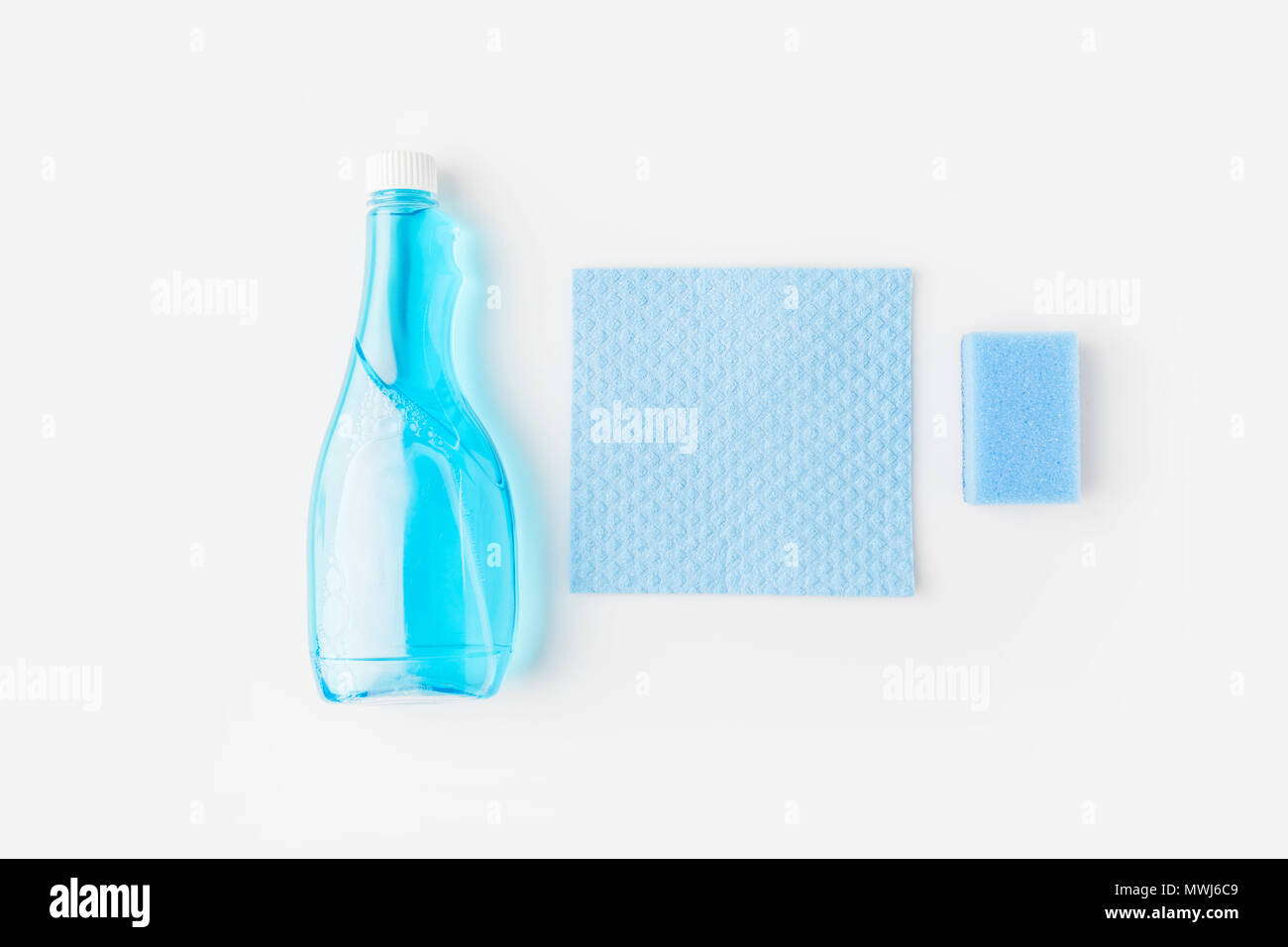 top view of blue bottle and washing sponges, isolated on white Stock ...