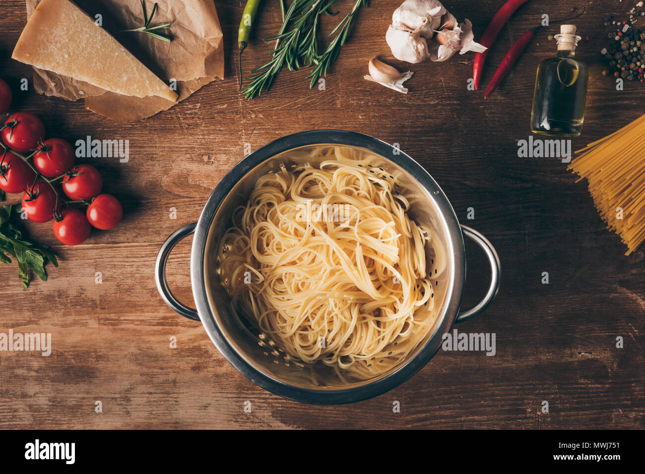 top view of spaghetti pasta and ingredients on wooden tabletop Stock ...