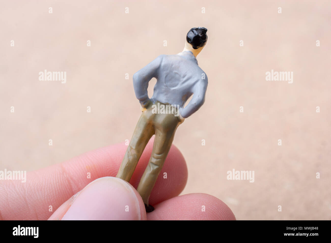 Little tiny man figurine in view Stock Photo - Alamy