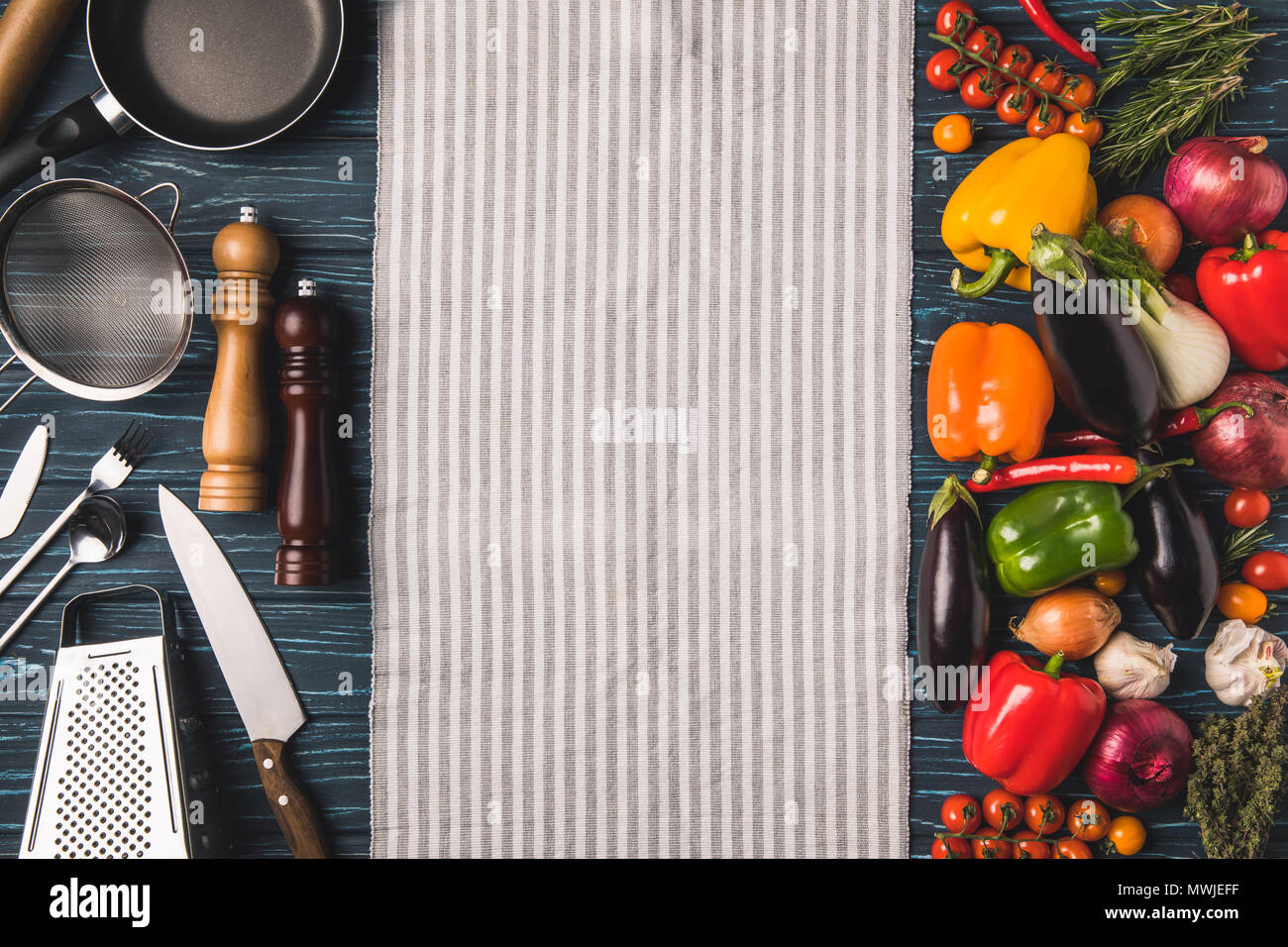 top view of utensil for cooking and vegetables on wooden table Stock ...