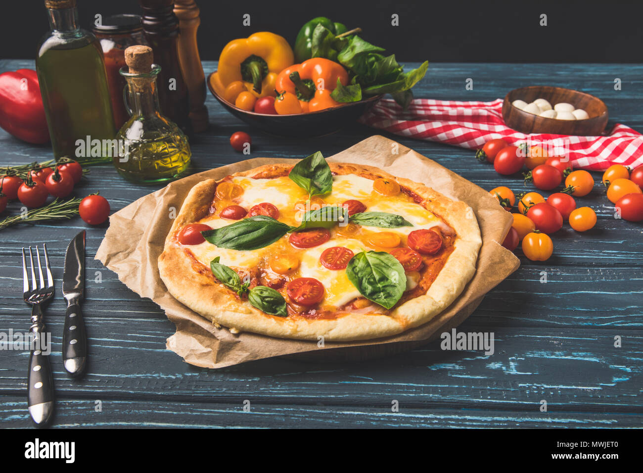 appetizing tasty pizza with cherry tomatoes and basil Stock Photo - Alamy