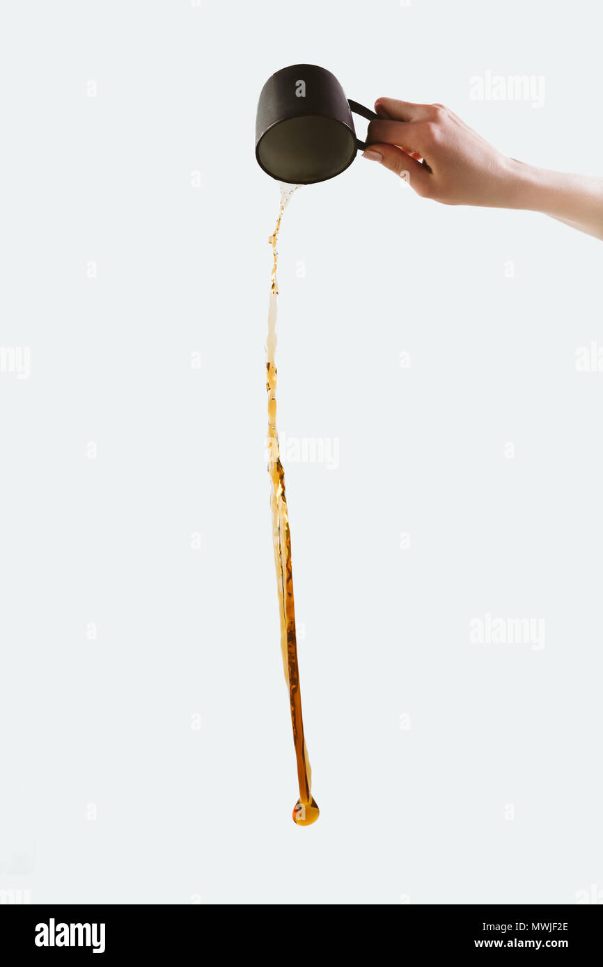 cropped view of hand pouring out coffee, isolated on white Stock Photo ...