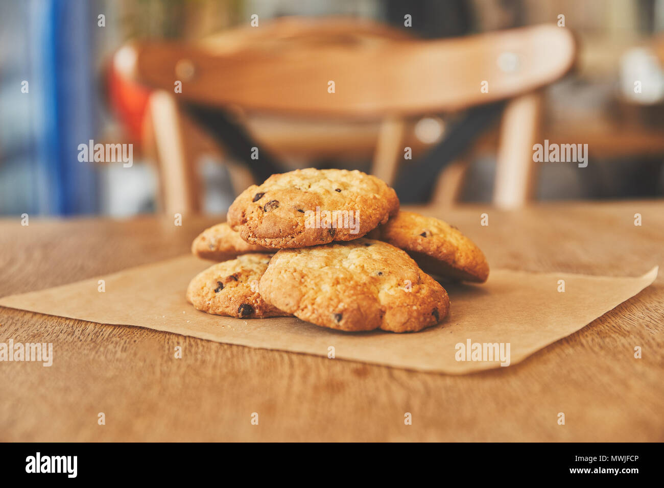 Homemade chocolate chip cookies on craft paper Stock Photo - Alamy
