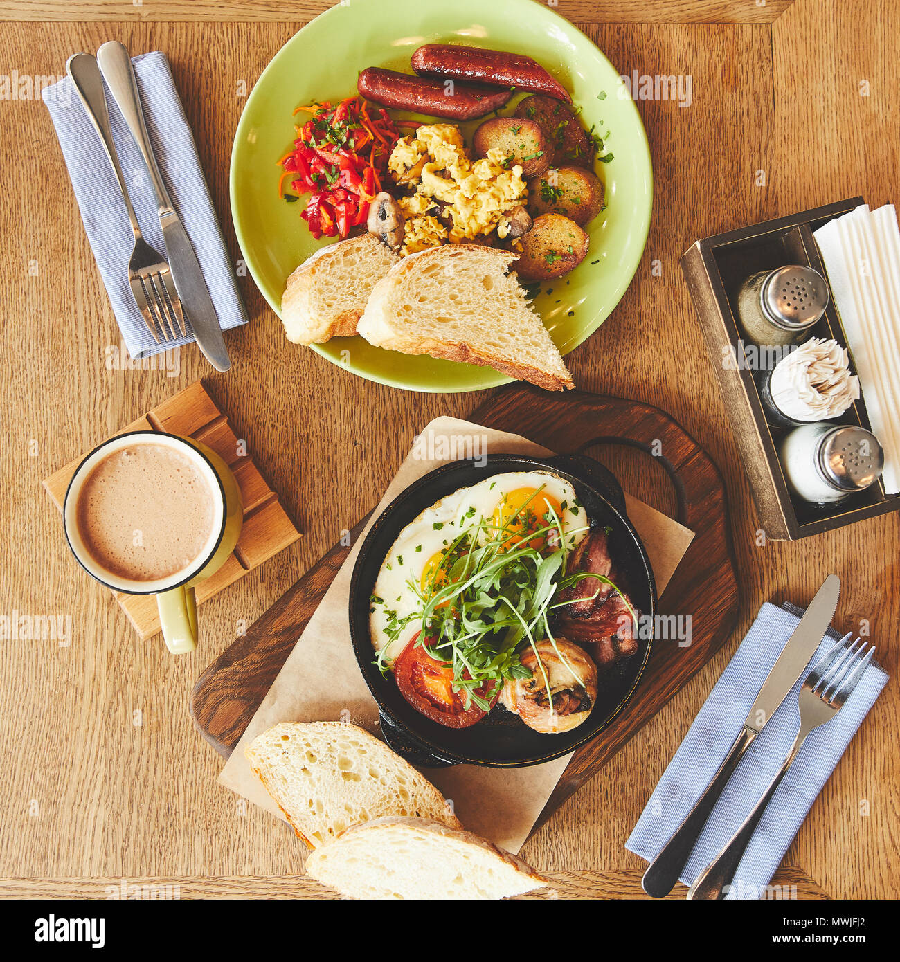 Brunch in restaurant with fried eggs and coffee Stock Photo - Alamy