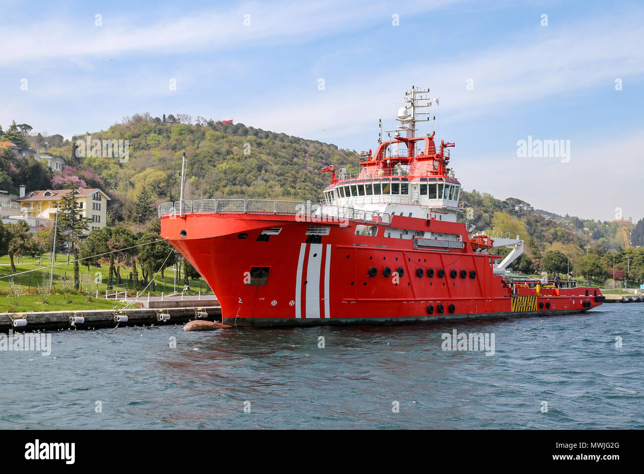 An Orange Coastal Safety Boat waiting in Shore Stock Photo - Alamy