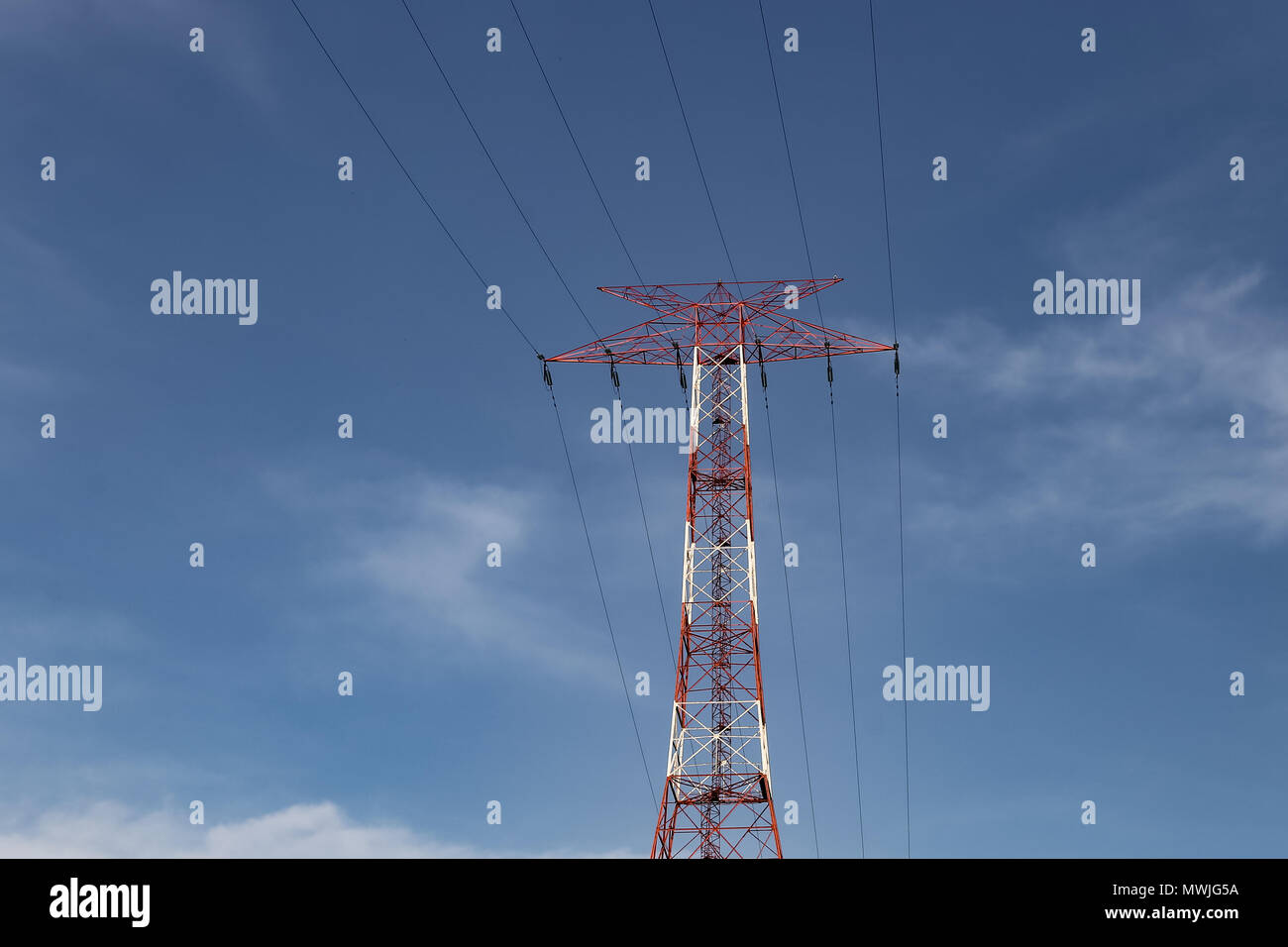 Red and White High Voltage Electric Pole Stock Photo - Alamy
