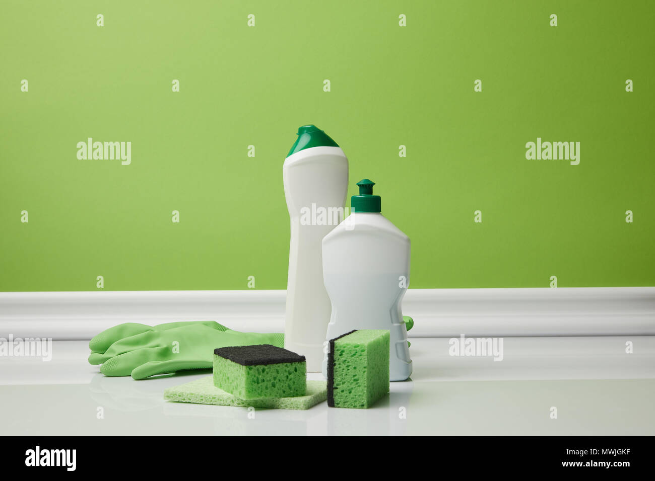 bottles and washing sponges for spring cleaning Stock Photo - Alamy