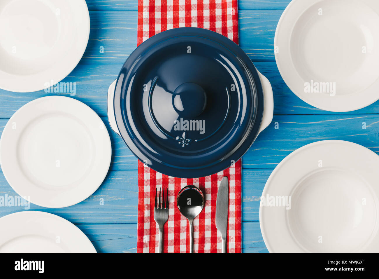 top view of served table with pan on blue table Stock Photo - Alamy