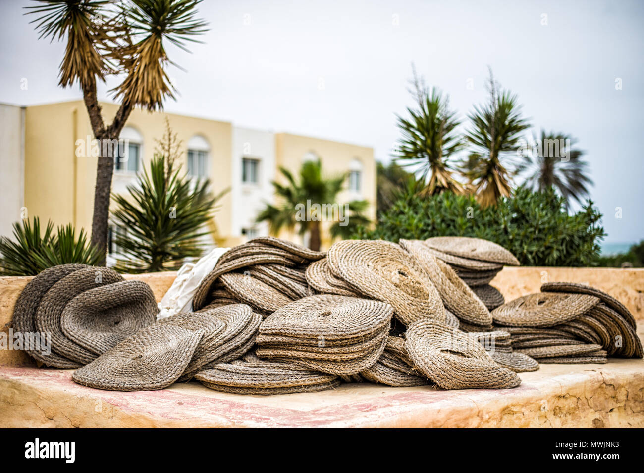 Round wicker seats in An ancient amphitheater with clay stepsin an Arab ...