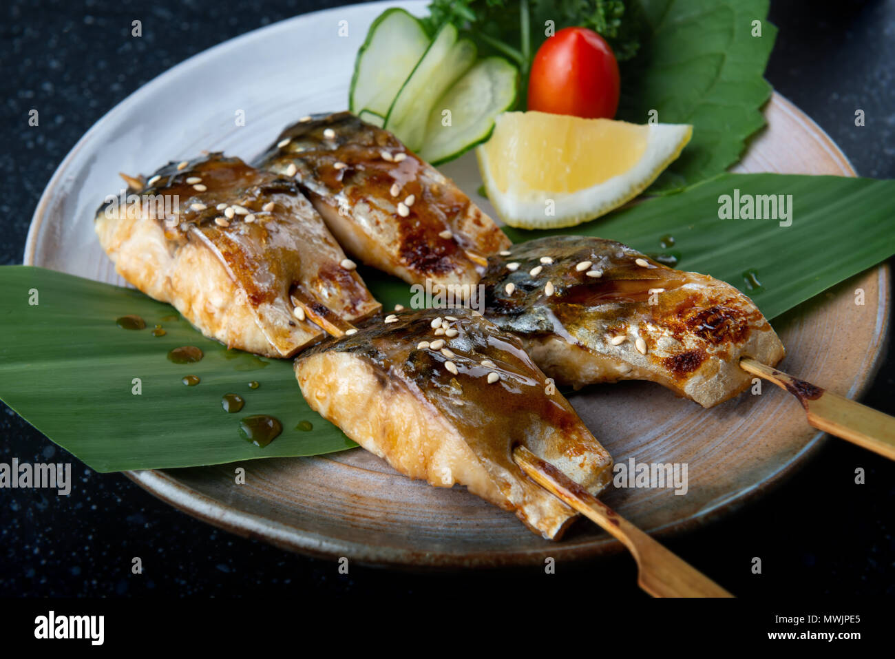 Skewer grilled saba fish with teriyaki sauce set and serve in Japanese ...