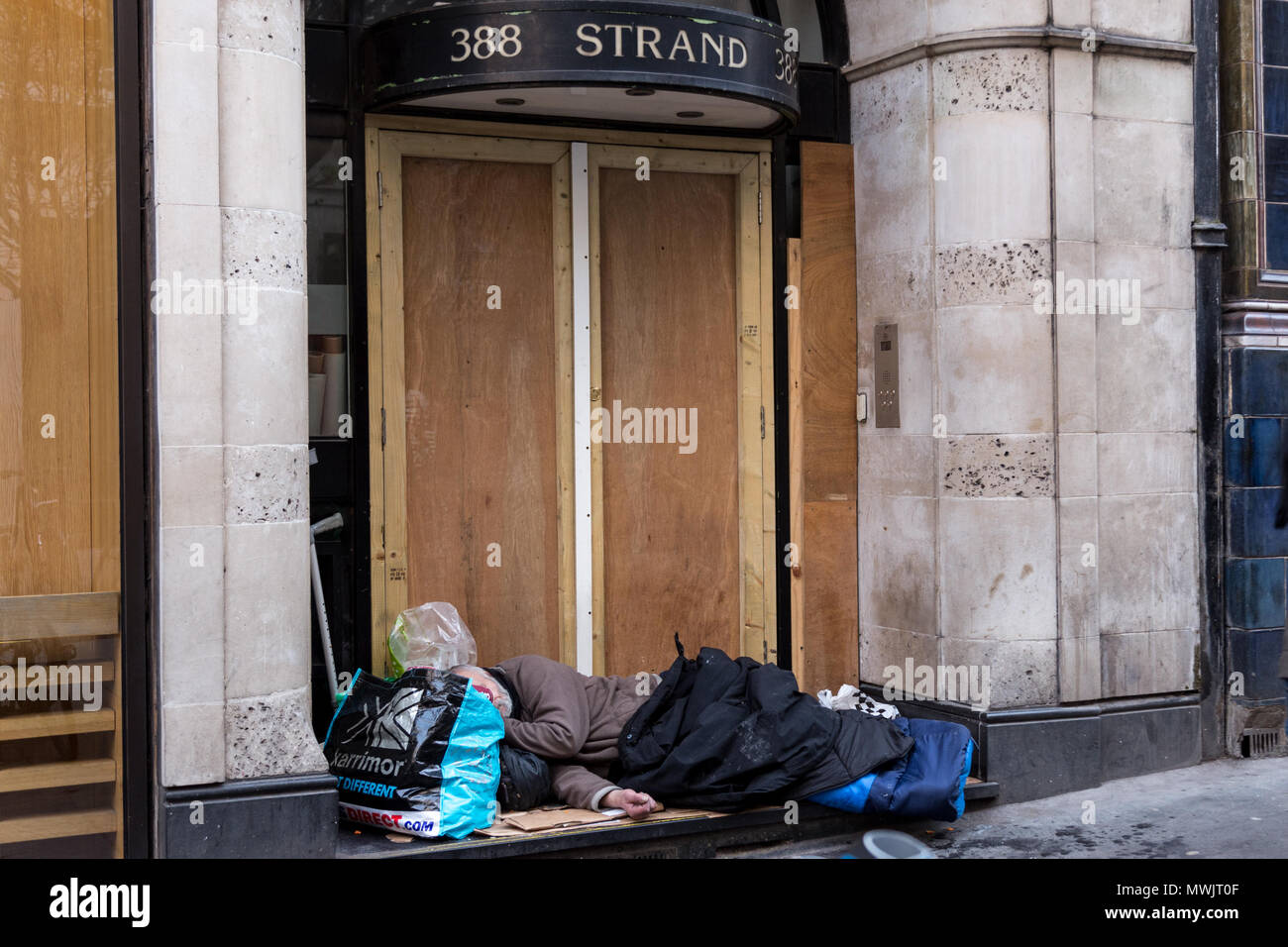 London, United Kingdom, April 18, 2018: A homeless man sleeps on the ...