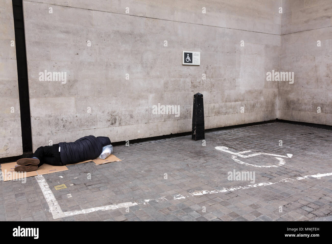 London, United Kingdom, April 18, 2018: A homeless man sleeps on the ...