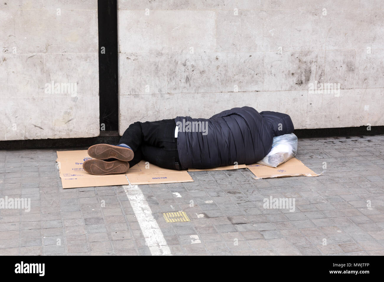 London, United Kingdom, April 18, 2018: A homeless man sleeps on the ...