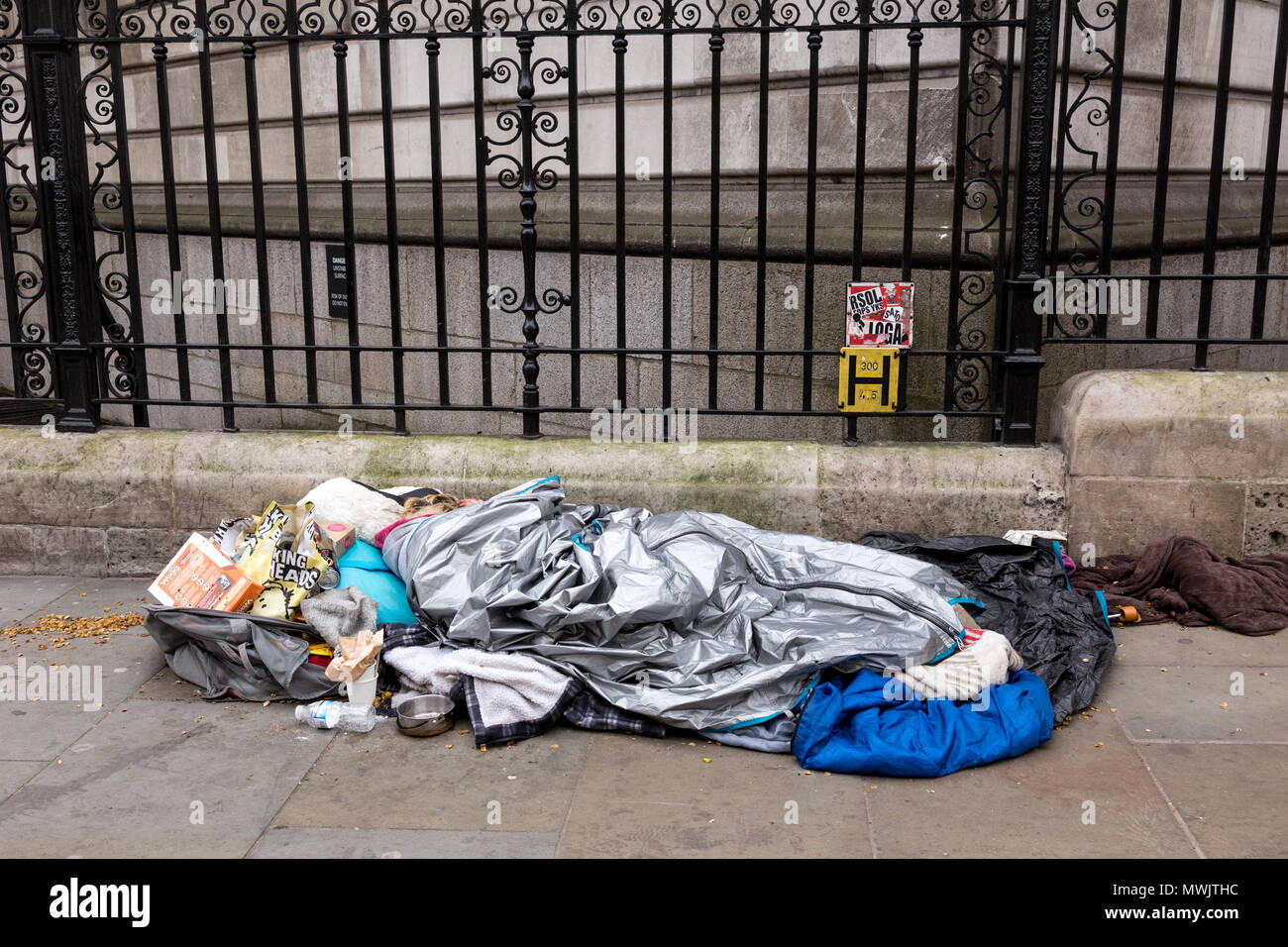 London, United Kingdom, April 18, 2018: A homeless man sleeps on the ...