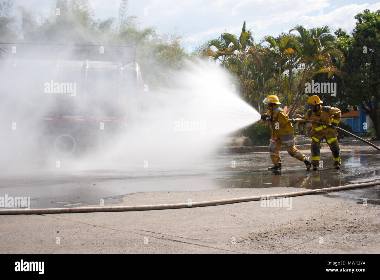 Firefighter fighting For A Fire Attack, During A Training Exercise ...