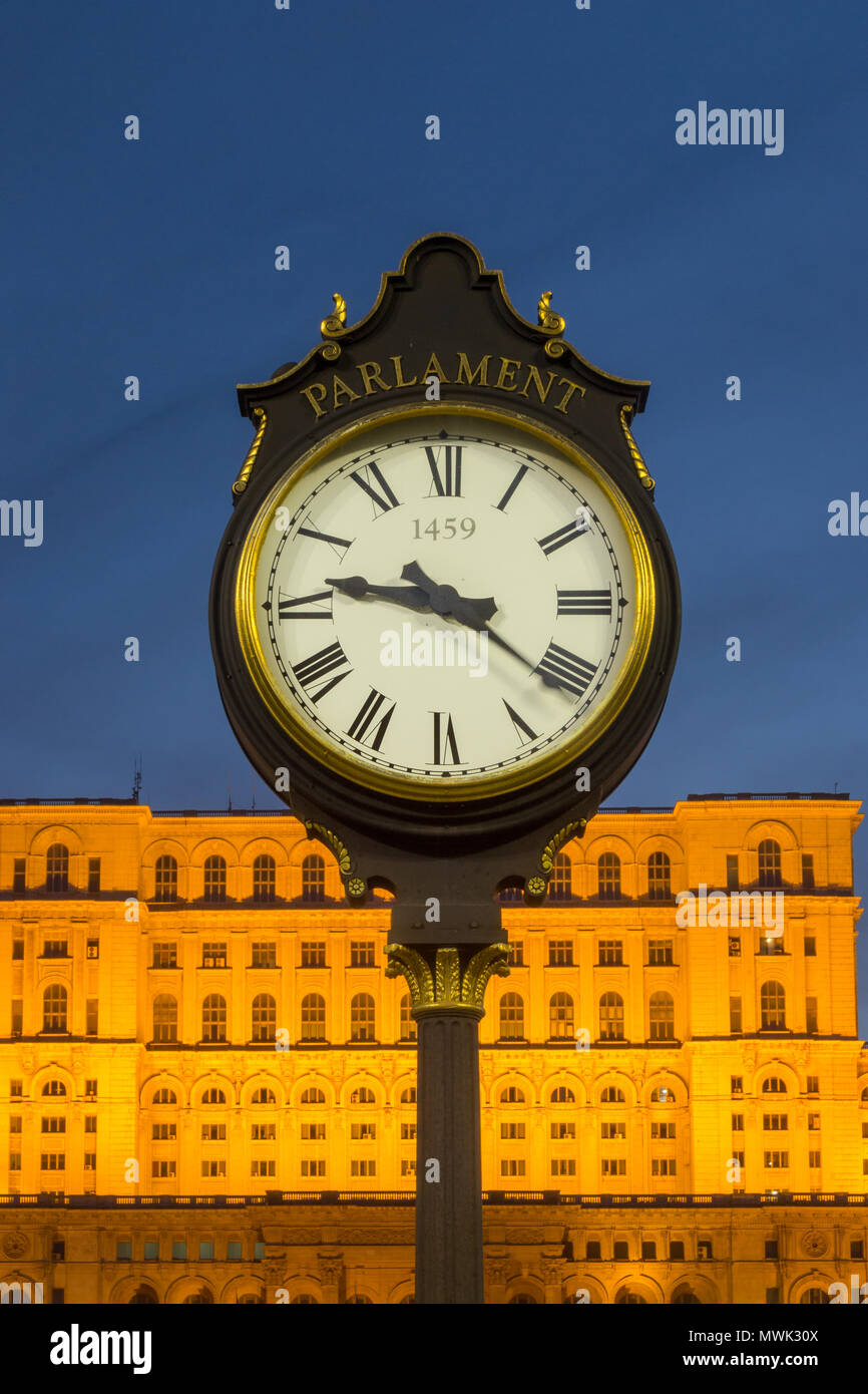 Clock in front of Parliament building - Bucharest Stock Photo - Alamy