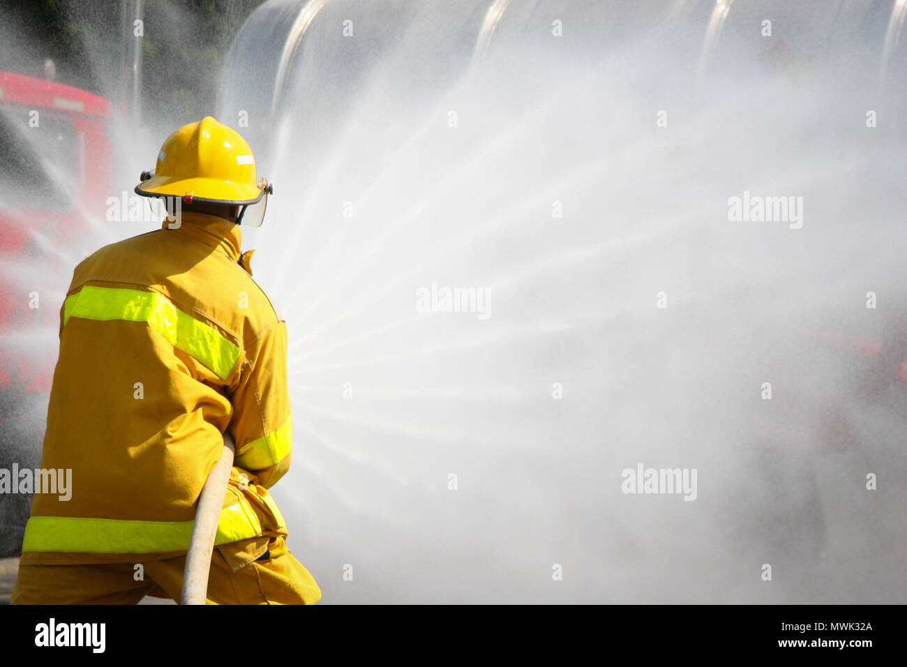 Firefighter fighting For A Fire Attack, During A Training Exercise ...
