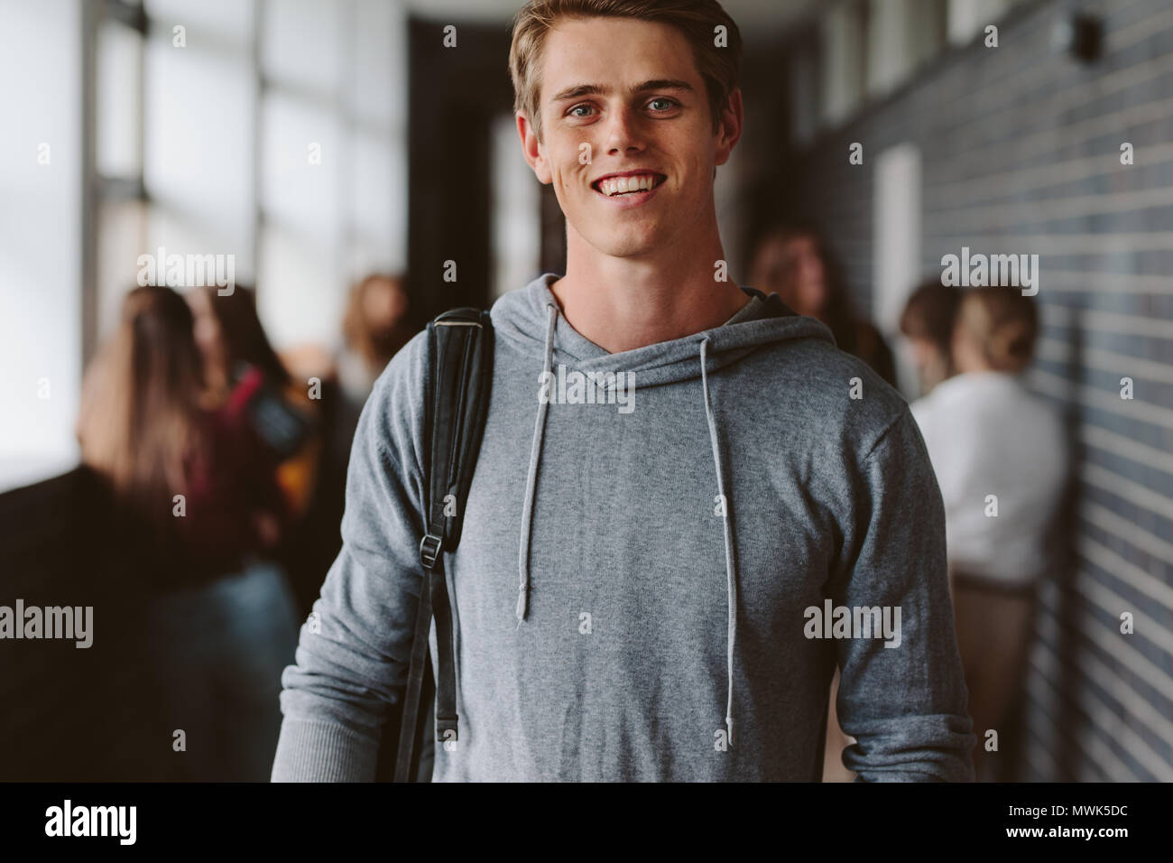 Male high school student walking hi-res stock photography and images ...