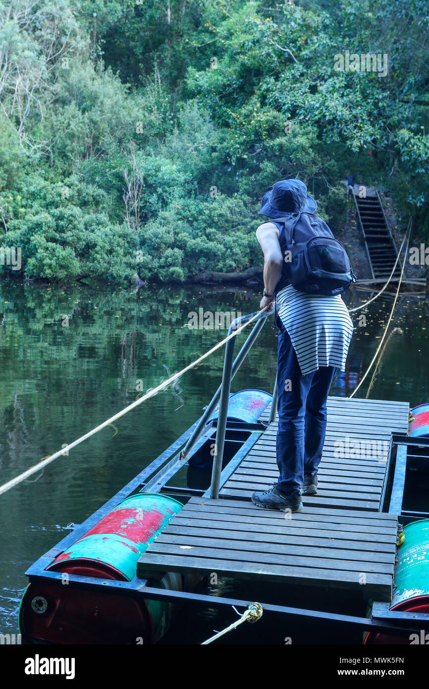 middle aged lady adventurer on a pontoon in the wilderness national ...