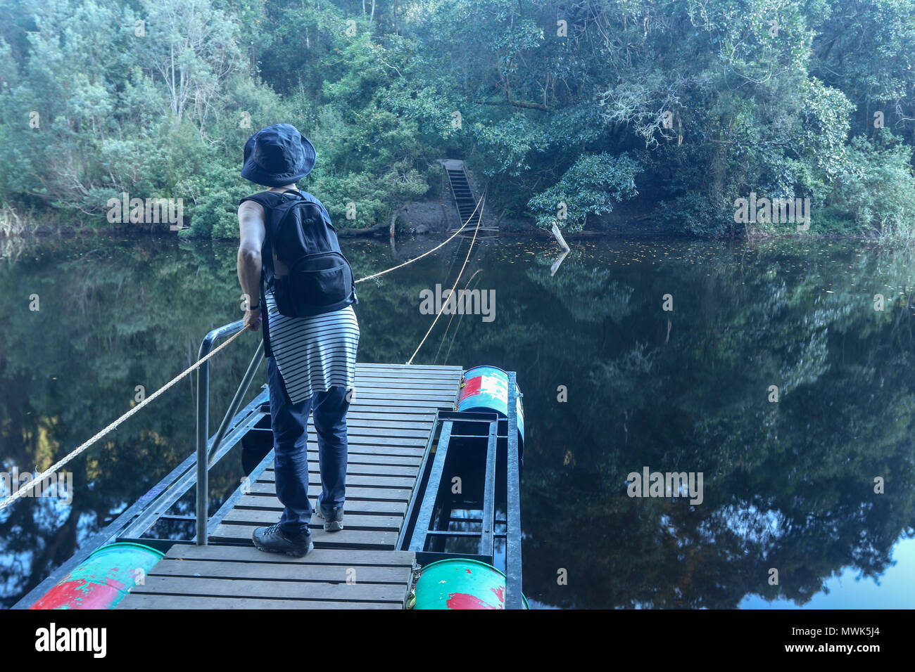 middle aged lady adventurer on a pontoon in the wilderness national ...