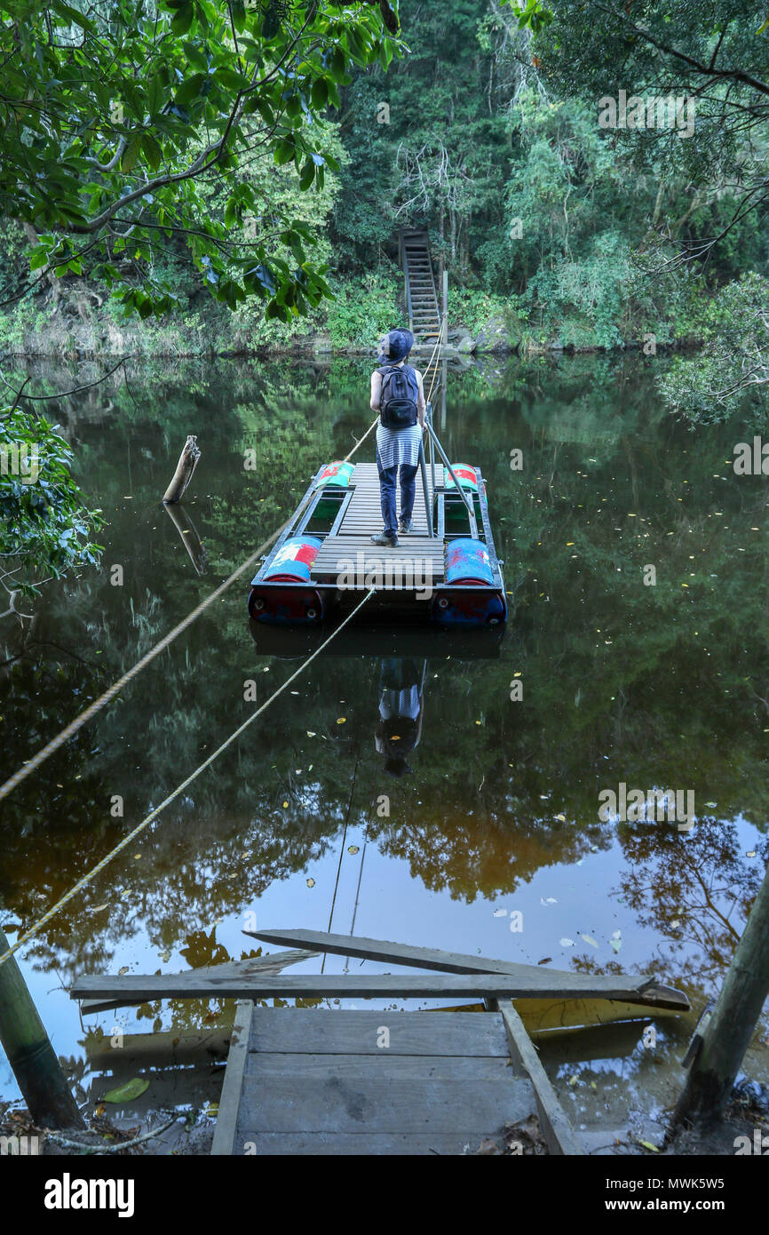 middle aged lady adventurer on a pontoon in the wilderness national ...