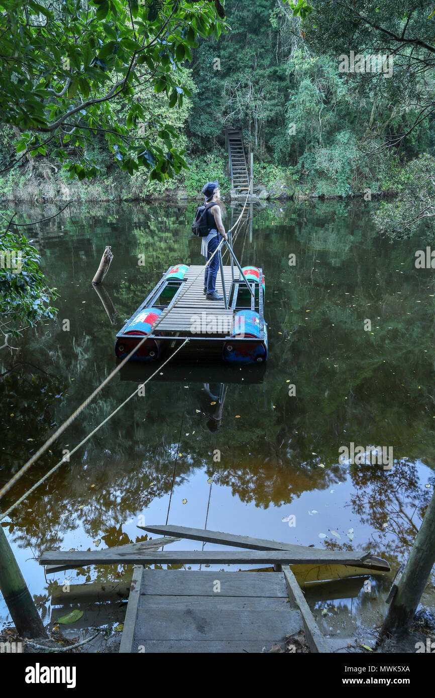 middle aged lady adventurer on a pontoon in the wilderness national ...