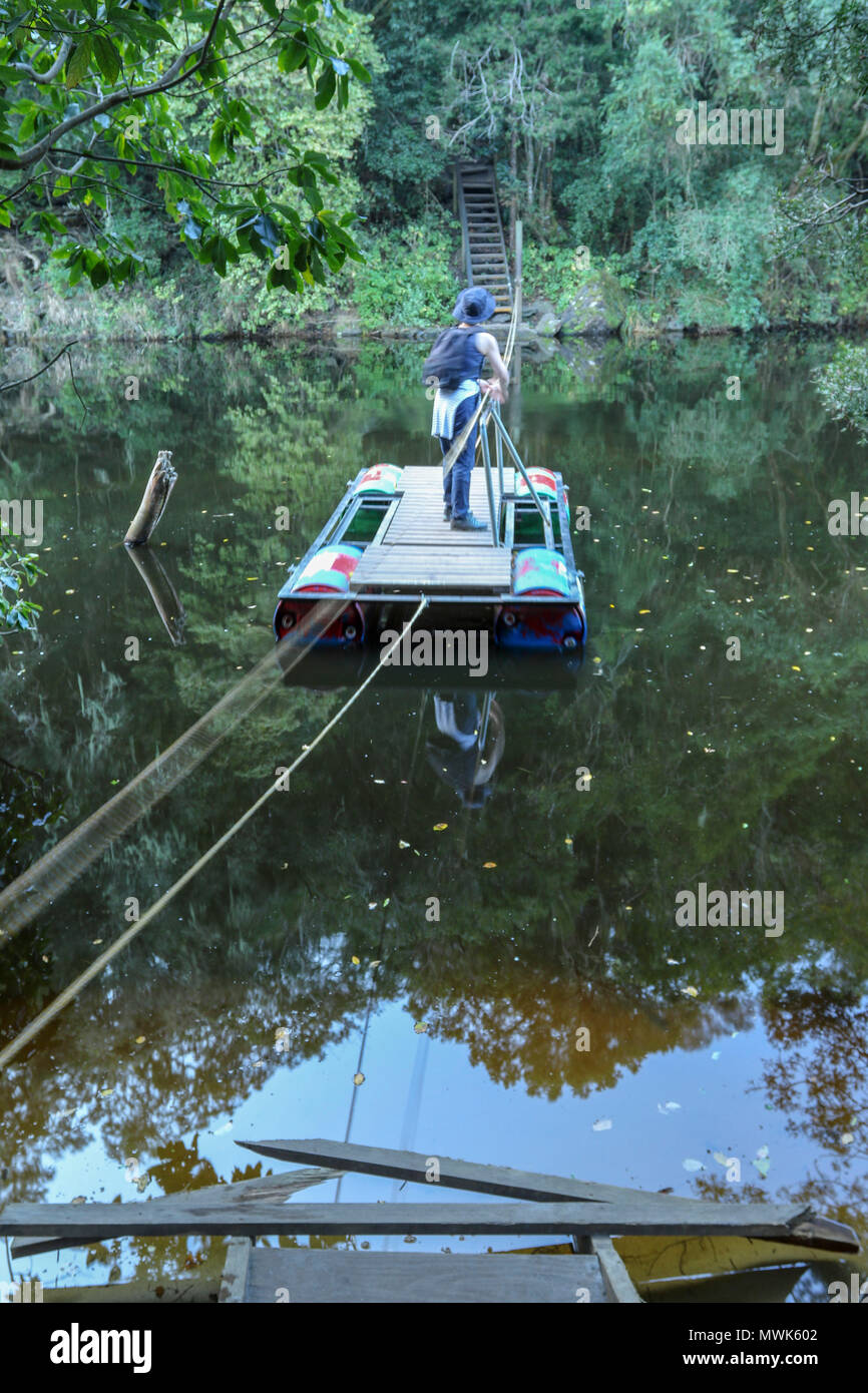 middle aged lady adventurer on a pontoon in the wilderness national ...