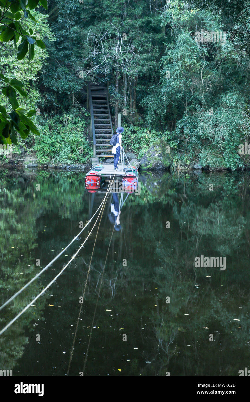 middle aged lady adventurer on a pontoon in the wilderness national ...