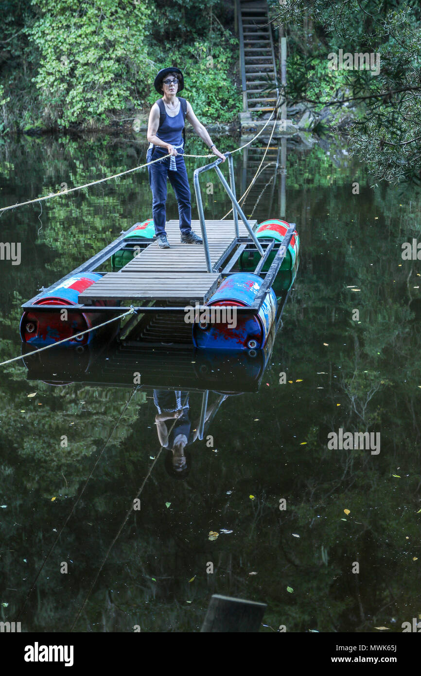 middle aged lady adventurer on a pontoon in the wilderness national ...