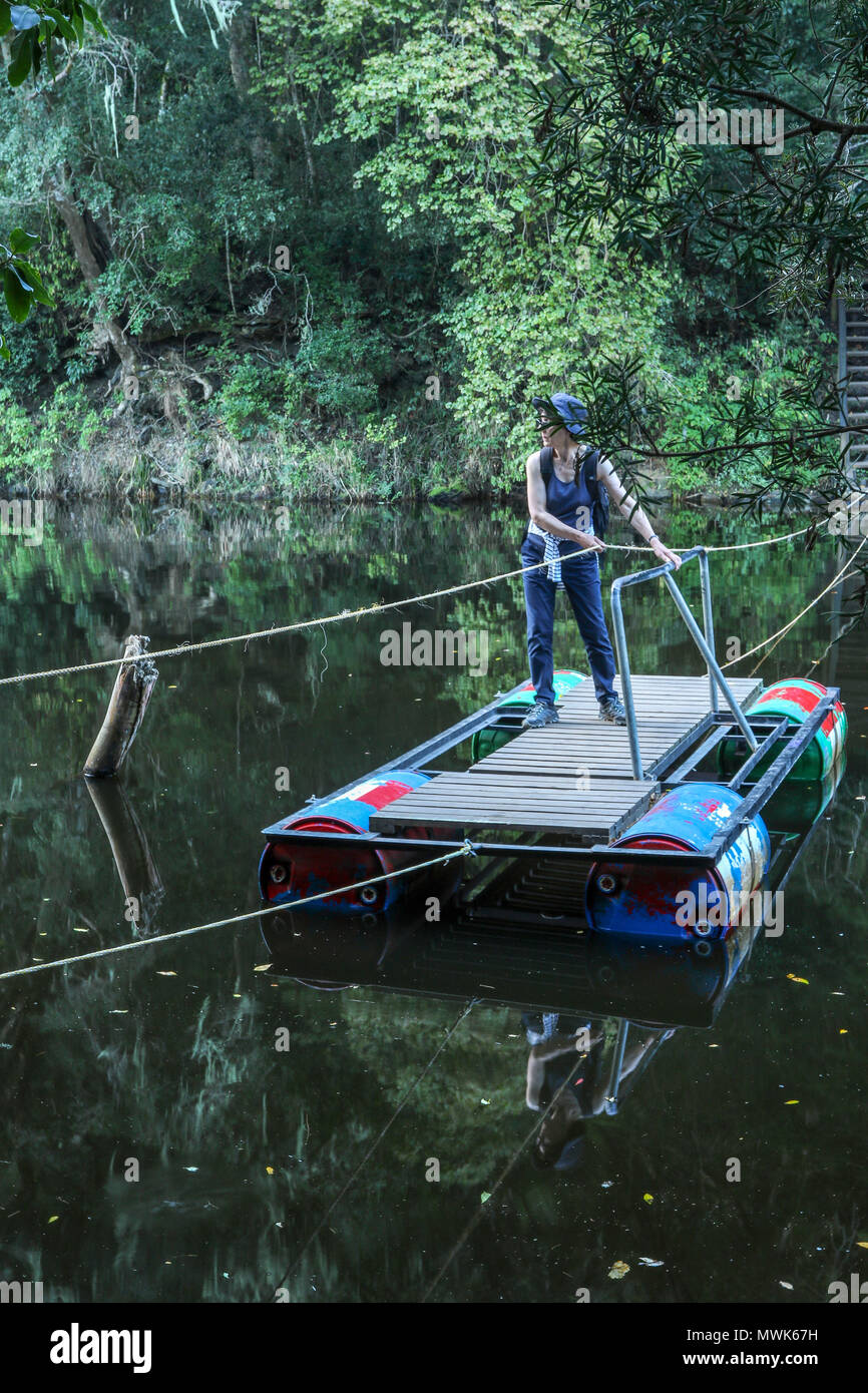 middle aged lady adventurer on a pontoon in the wilderness national ...