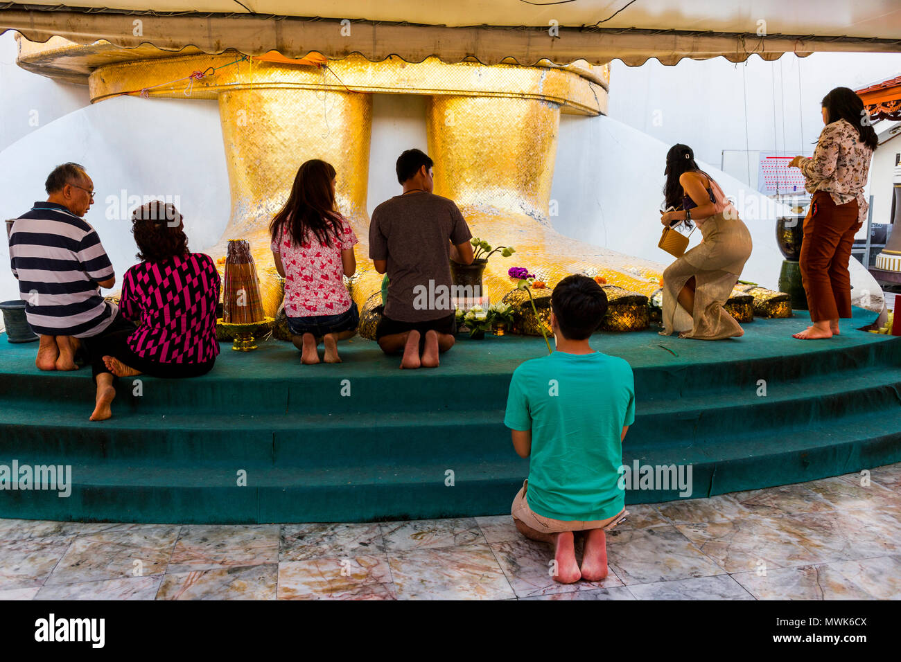 Praying girl in a temple hi-res stock photography and images - Alamy