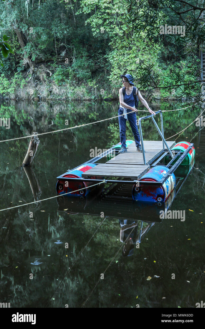 middle aged lady adventurer on a pontoon in the wilderness national ...