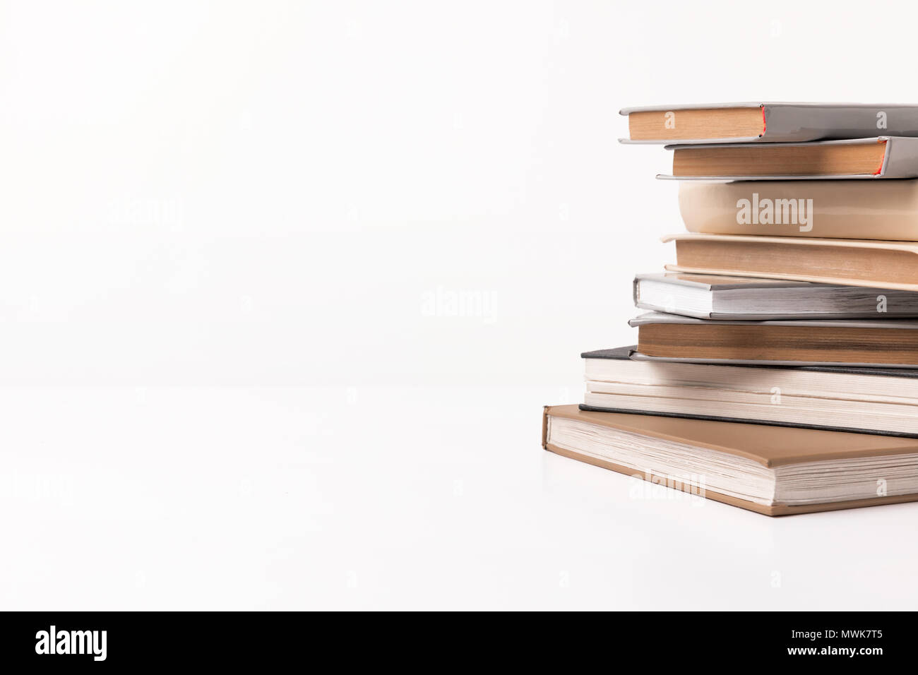 Stack of different books isolated on white Stock Photo - Alamy