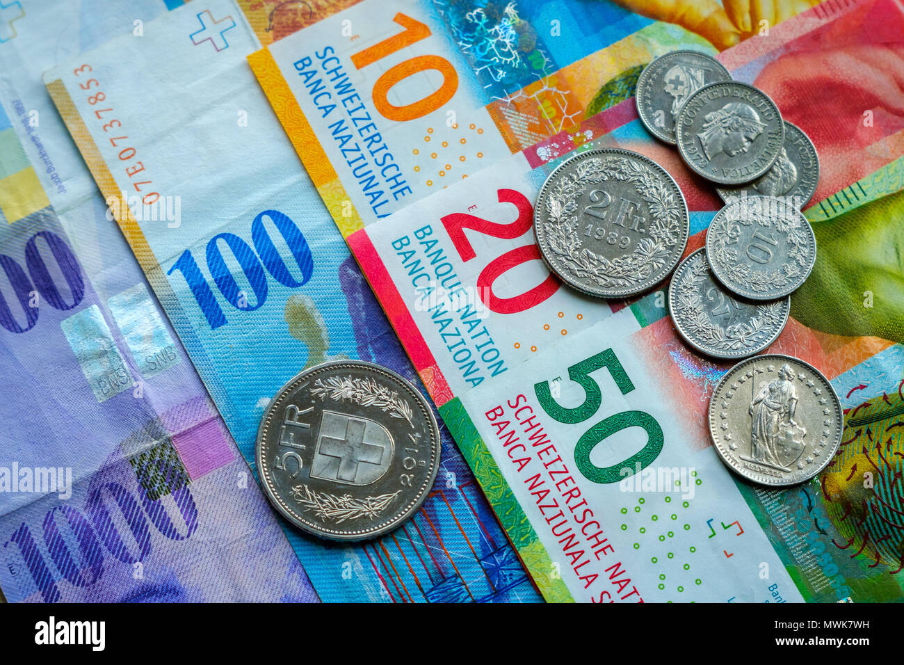 Swiss money banknotes and coins Stock Photo - Alamy