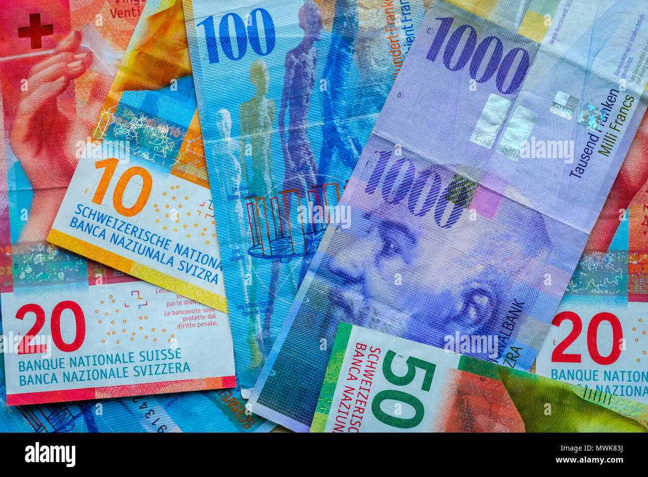 Swiss money banknotes background Stock Photo - Alamy